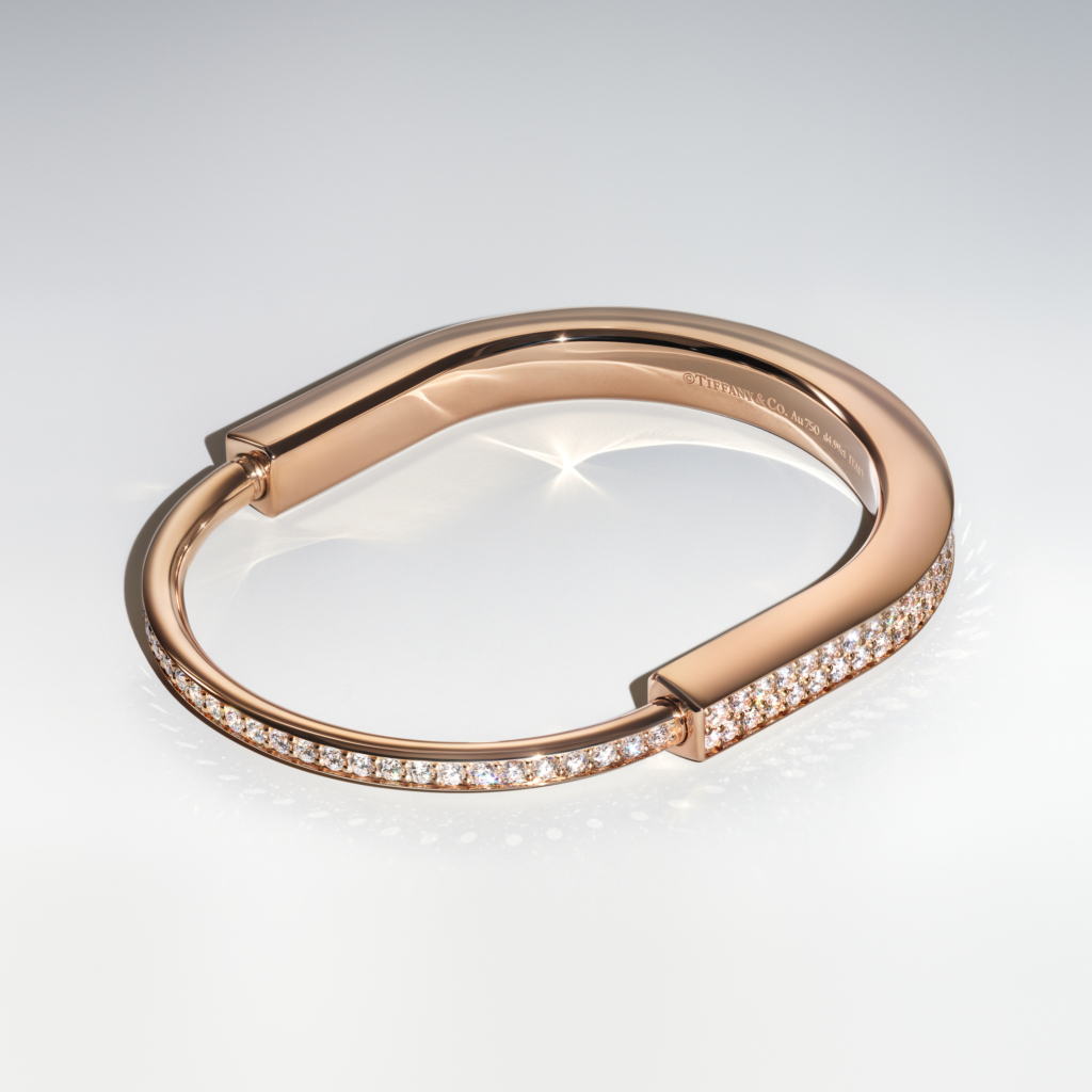 Tiffany Lock bangle in 18k rose and white gold with diamonds. - Tiffany