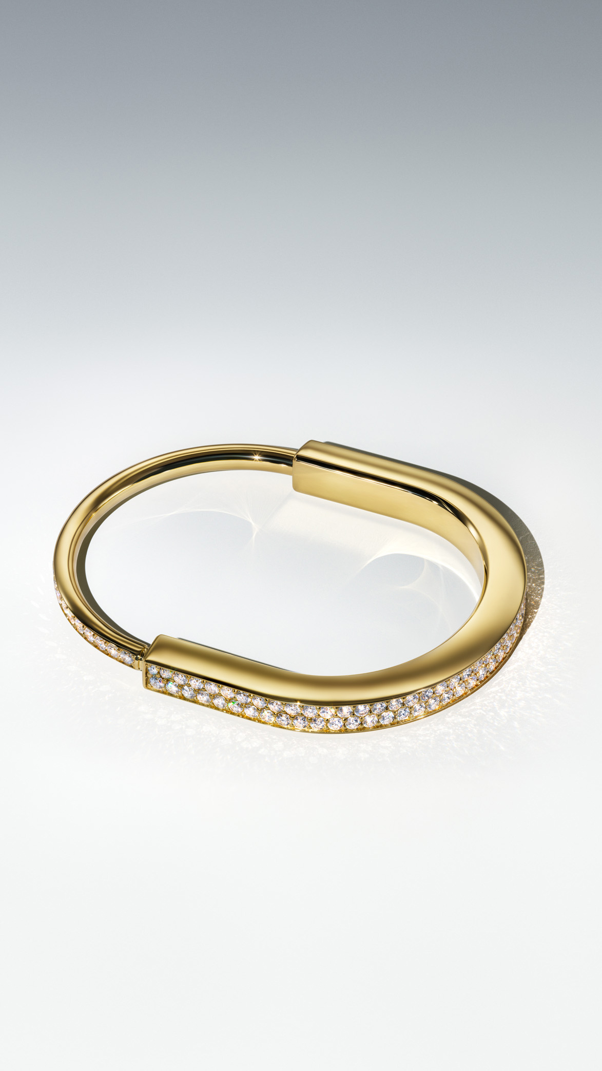 Tiffany Lock bangle in 18k yellow gold with diamonds. - Tiffany